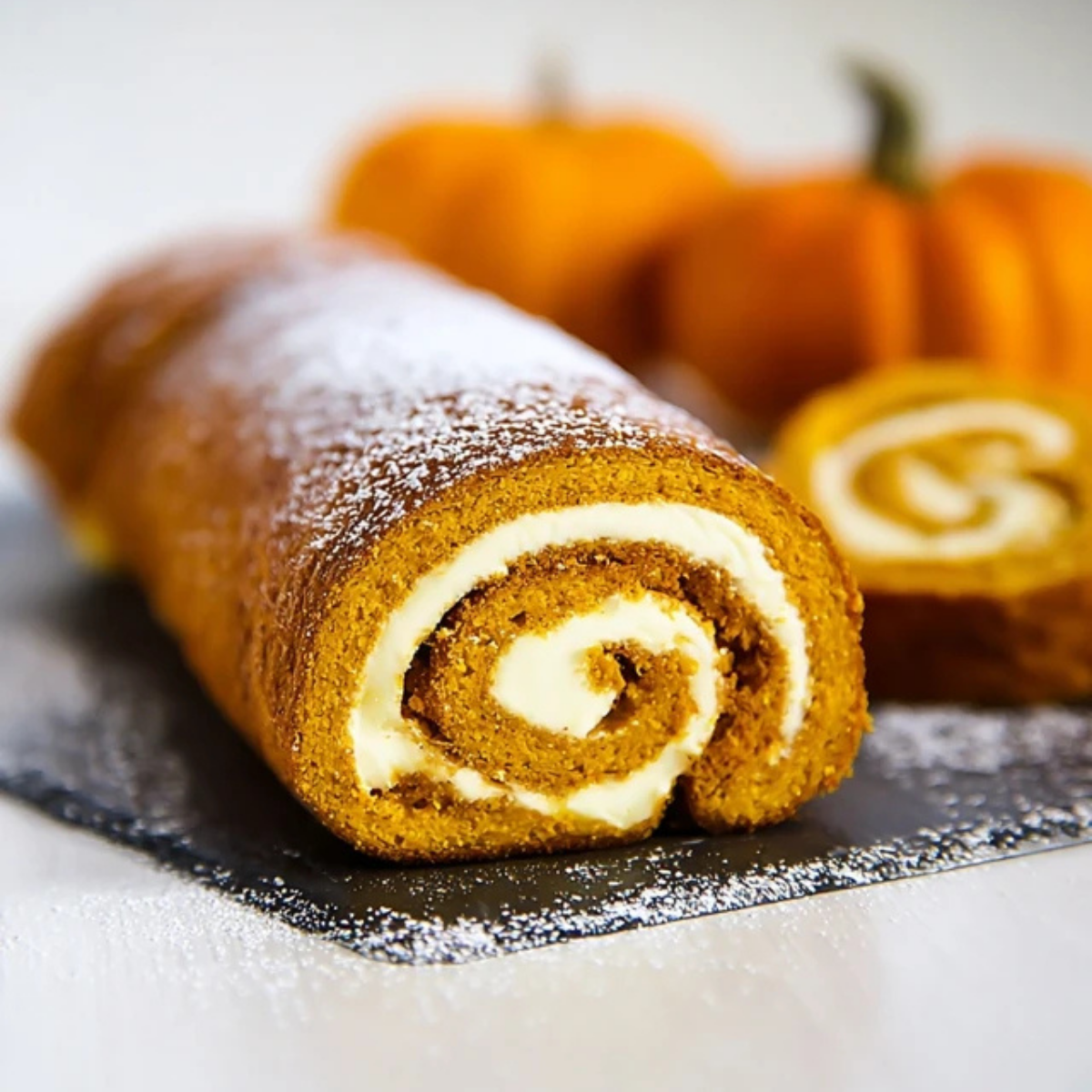 Pumpkin Rolls – A Classic Holiday Dessert with Creamy Filling - Quite Chefy