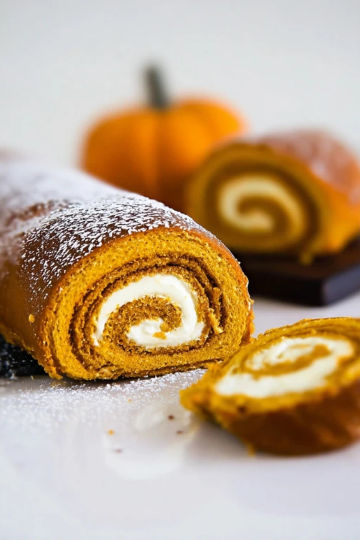 Pumpkin Rolls – A Classic Holiday Dessert with Creamy Filling - Quite Chefy